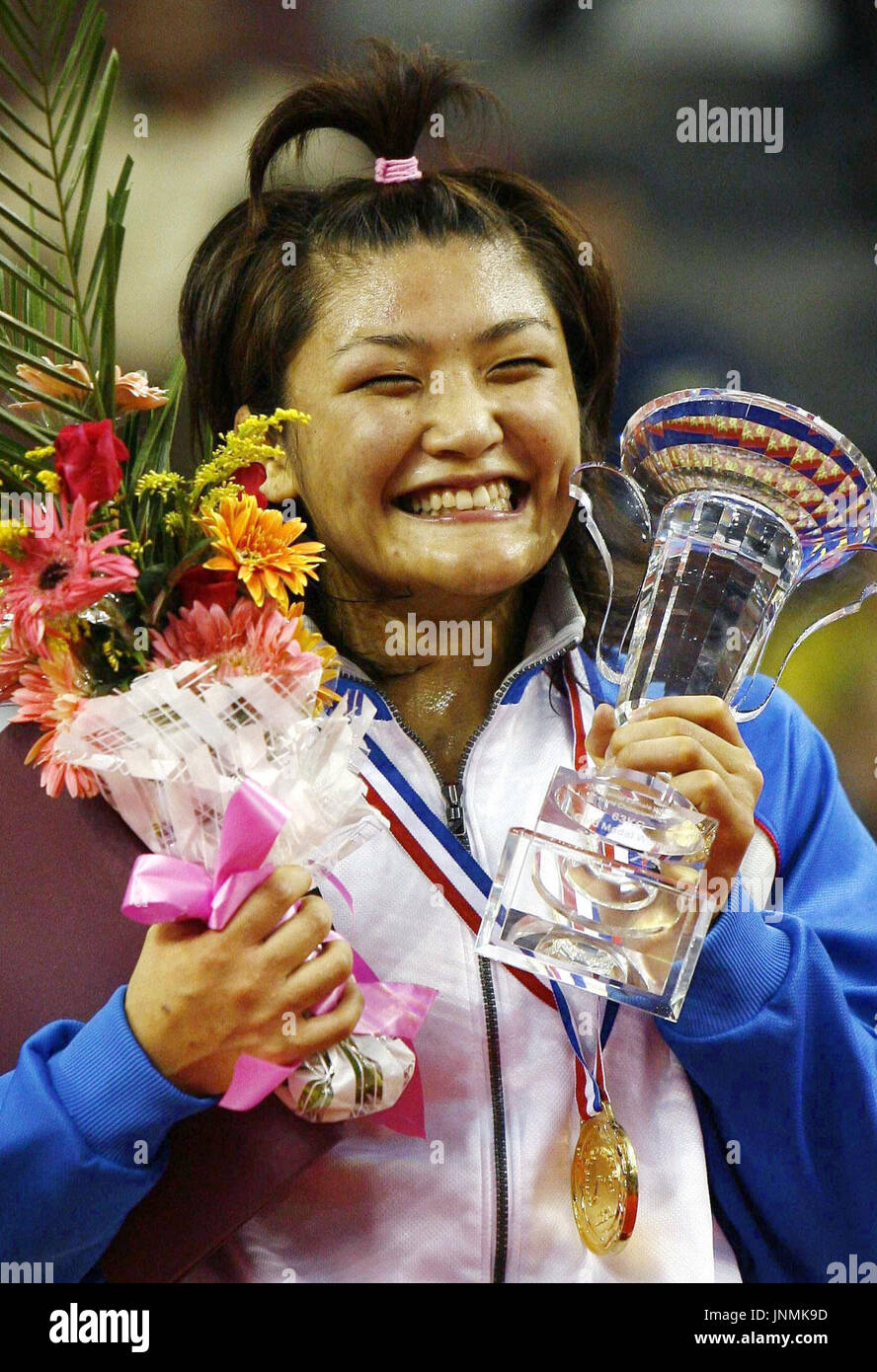 GUANGZHOU, China - Kaori Icho shows her joy at the award ceremony after ...