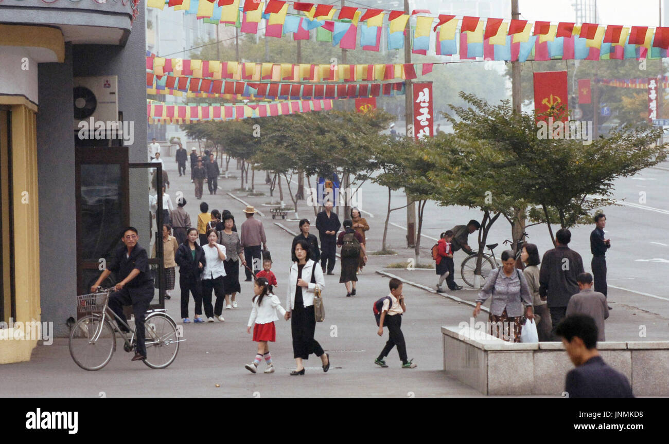 PYONGYANG, North Korea - Pyongyang citizens walk along the street ...