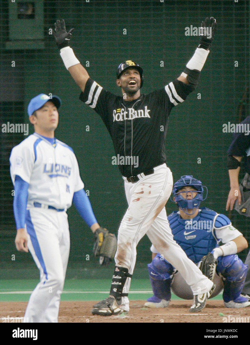 TOKOROZAWA, Japan - Softbank Hawks slugger Julio Zuleta reacts after ...