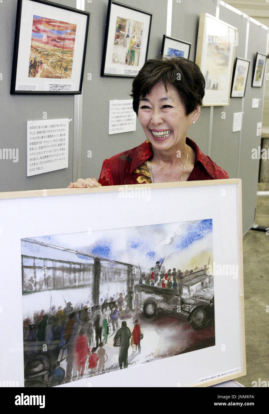 HIROSHIMA, Japan - Japanese-American artist Chizuko Sugita holds one of ...