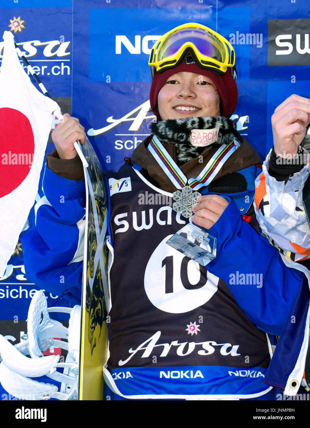 AROSA, Switzerland - Japan's Kazuhiro Kokubo shows off the silver medal ...