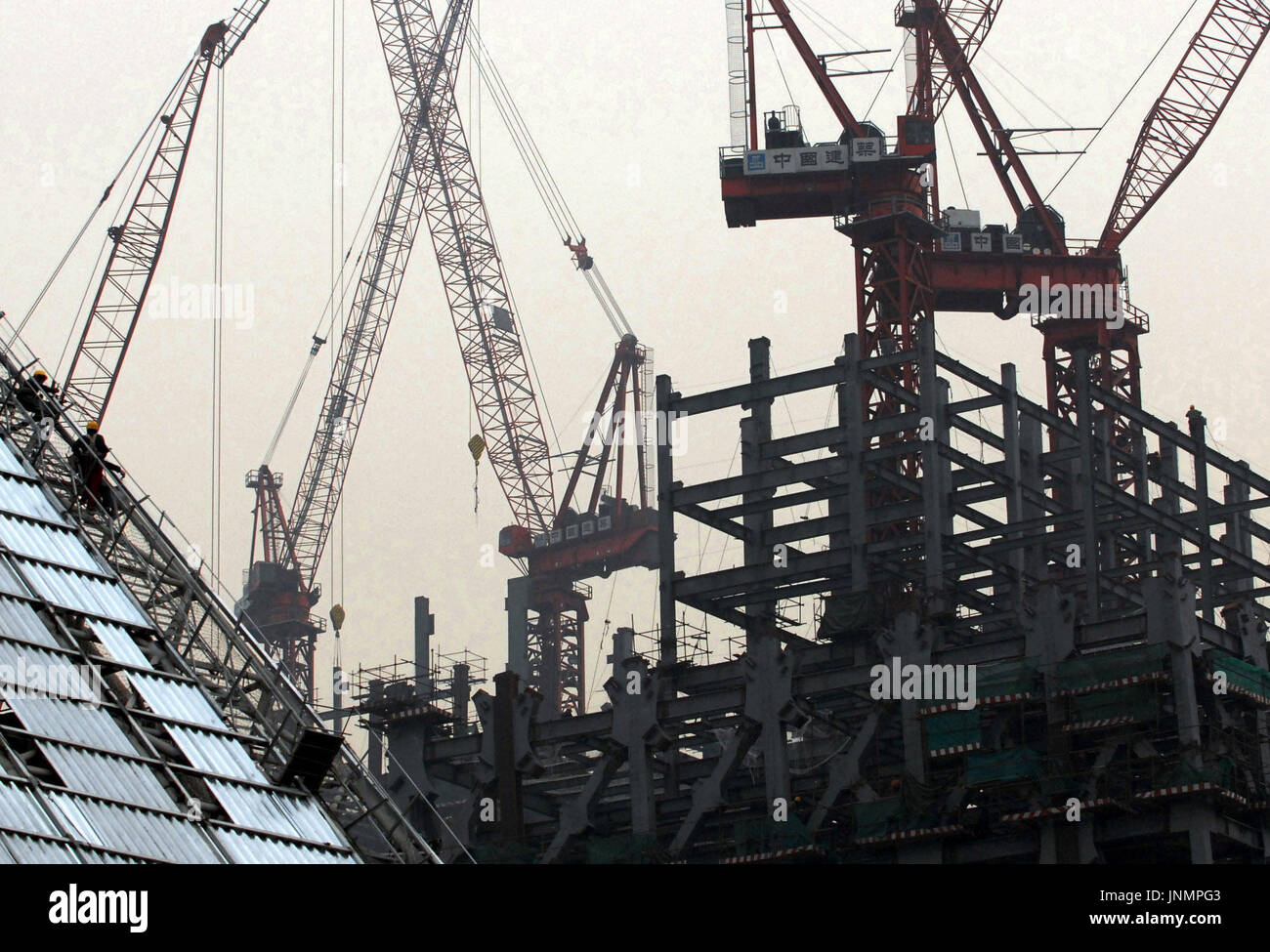 BEIJING, China - A construction boom is sweeping across major cities in ...