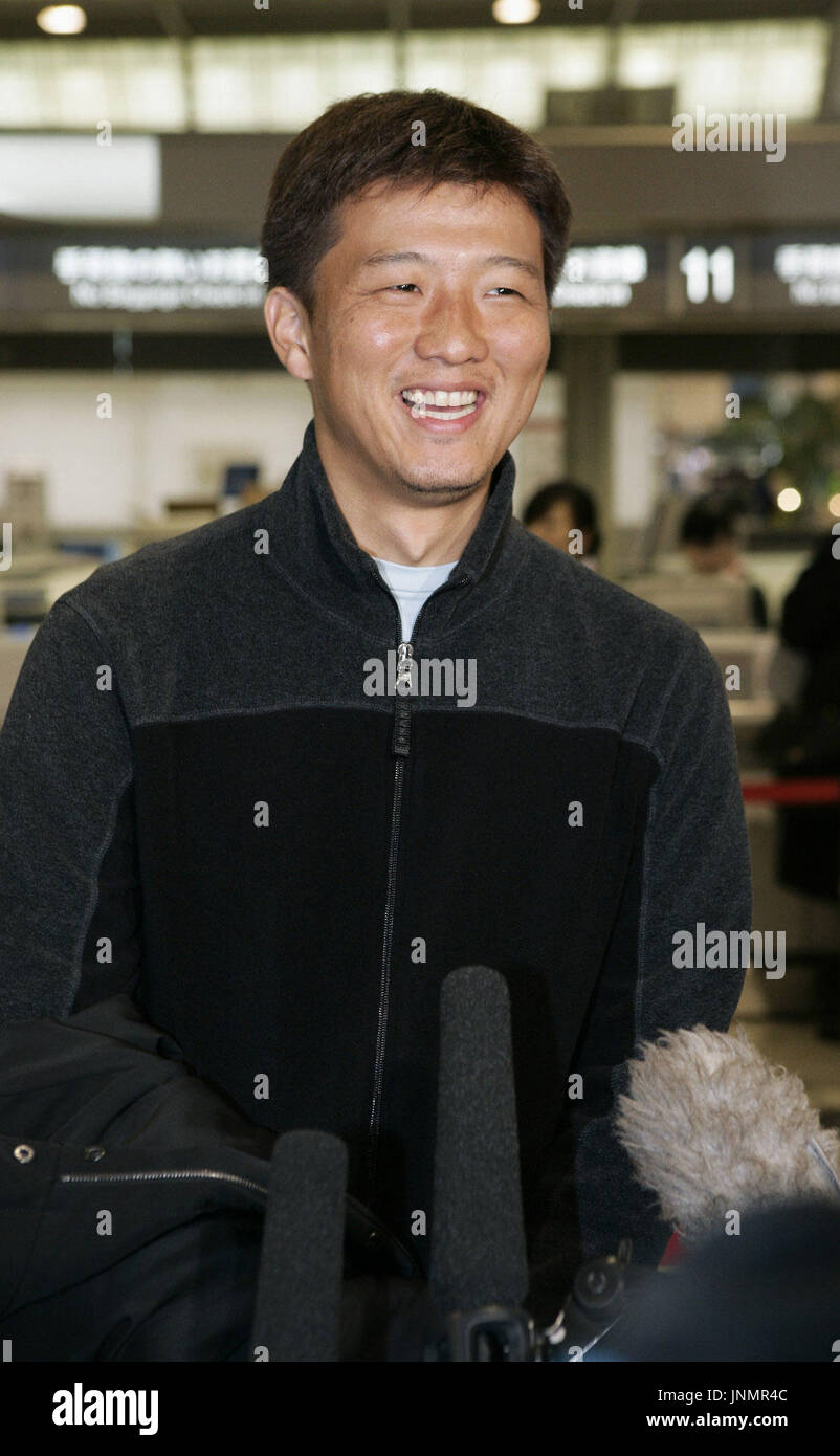 NARITA, Japan - Japanese pitcher Hideki Okajima speaks with reporters ...