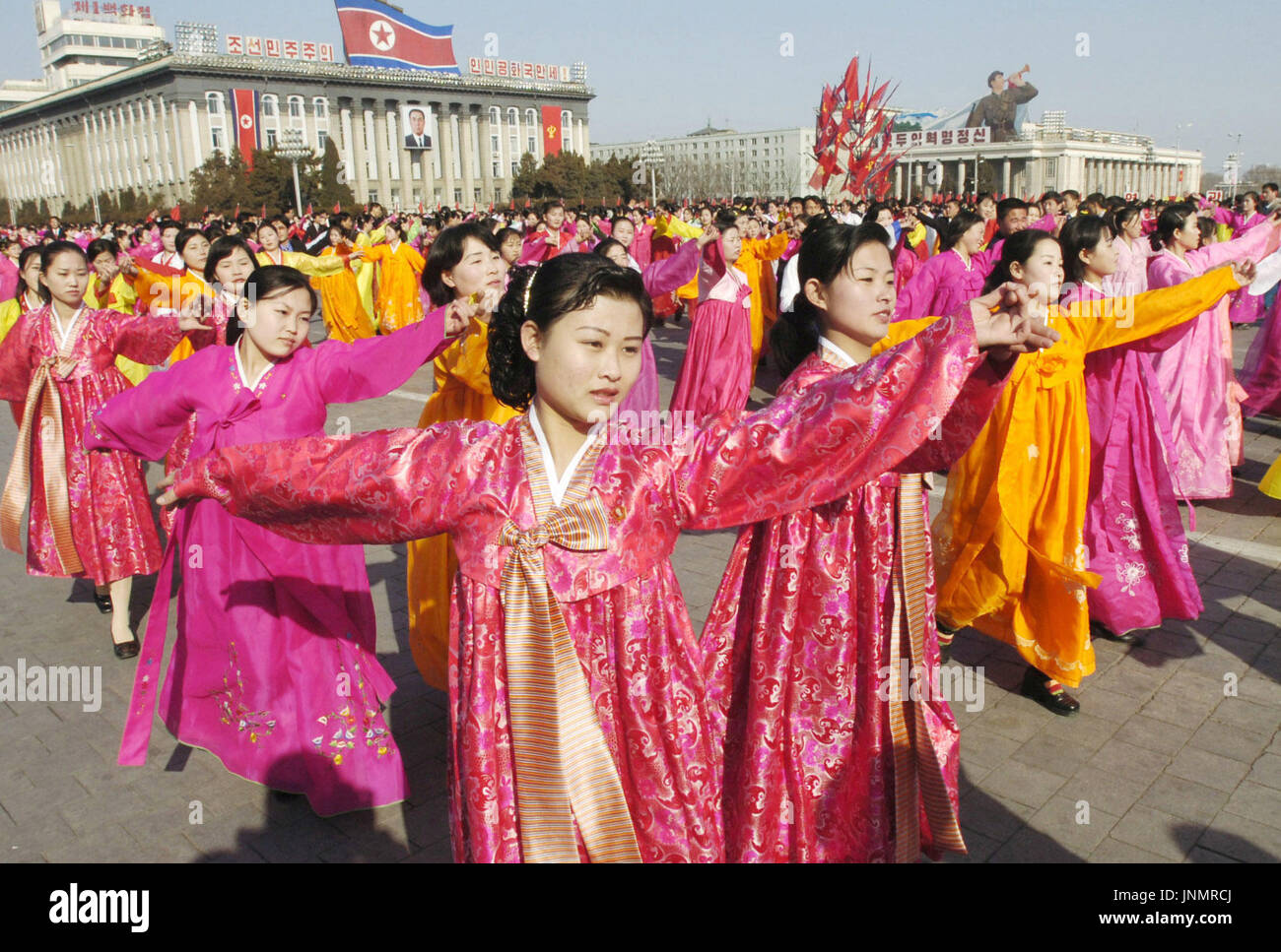 PYONGYANG, North Korea -Young men in suits and women in colorful ...