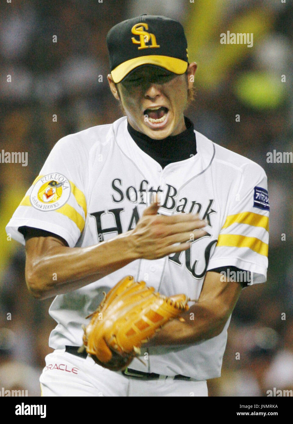 FUKUOKA, Japan - Softbank Hawks right-hander Kazumi Saito reacts after the game in which he ...