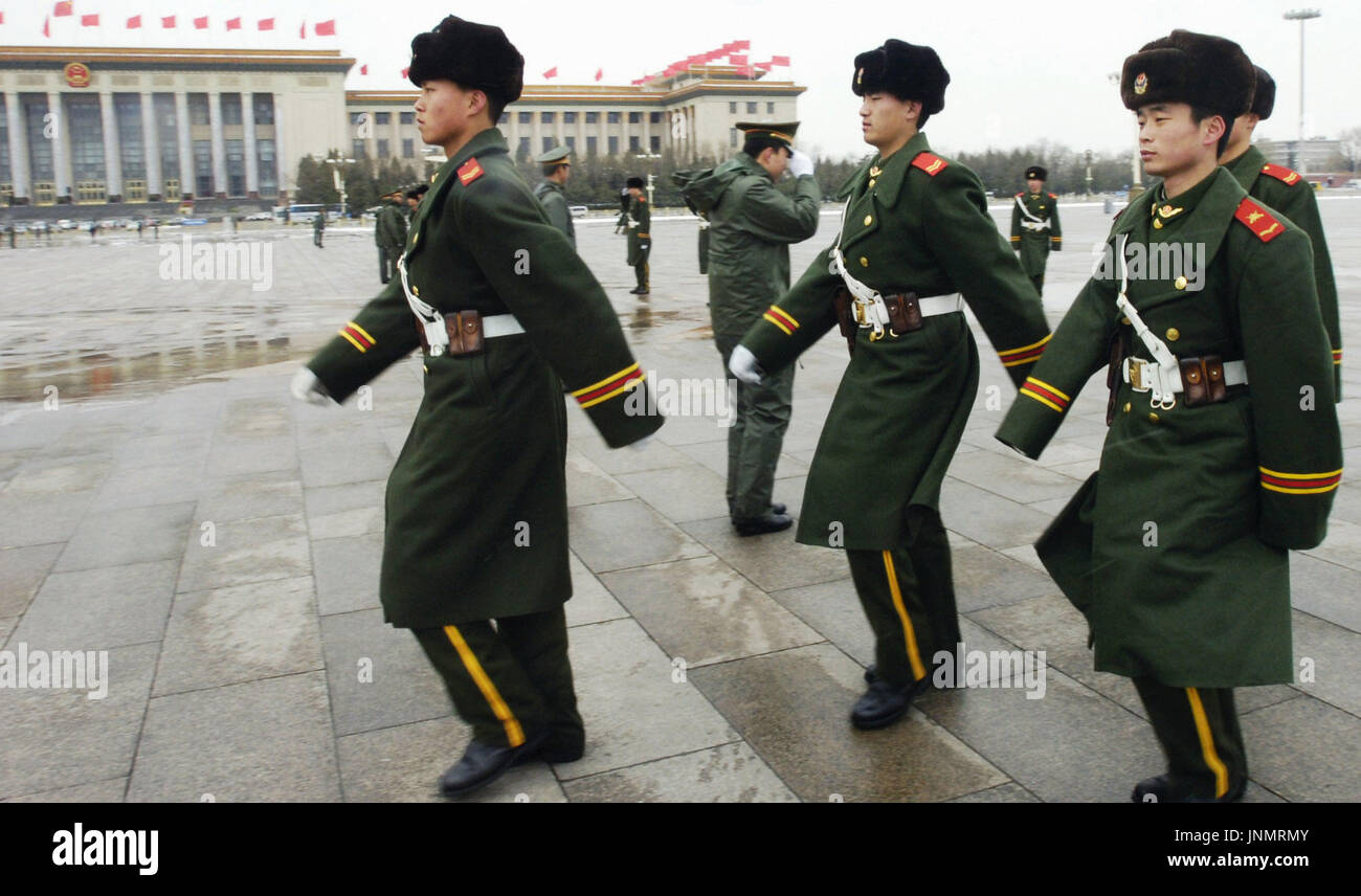 BEIJING, China - Police officers patrol outside the Great Hall of the ...