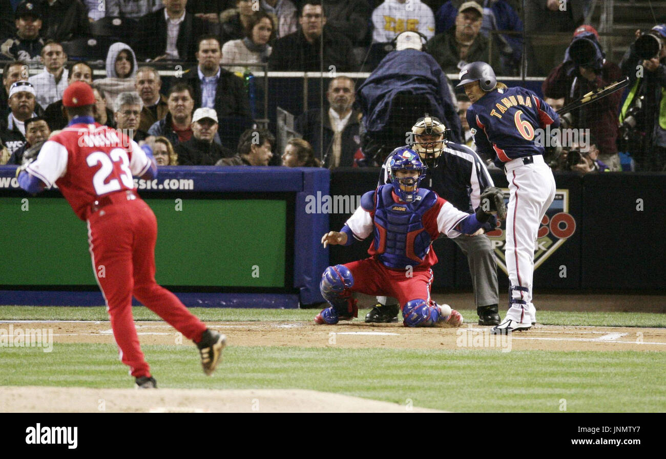 SAN DIEGO, United States - Team Japan outfielder Hitoshi Tamura is hit ...