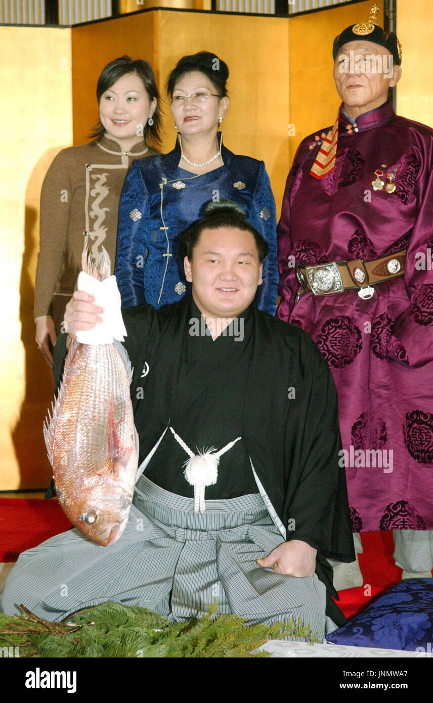 OSAKA, Japan - Mongolian Hakuho, holding up a bream, poses for photos ...