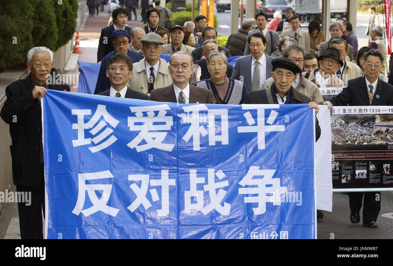 TOKYO, Japan - A group of Chinese who were wounded or lost their family ...