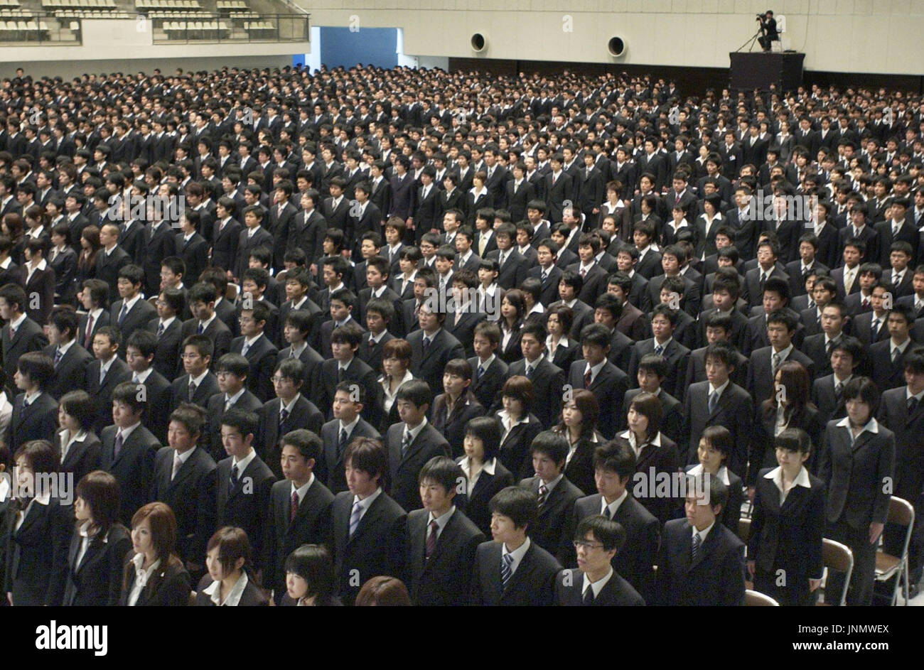 TOYOTA, Japan - New employees of Toyota Motor Corp. attend a ceremony ...