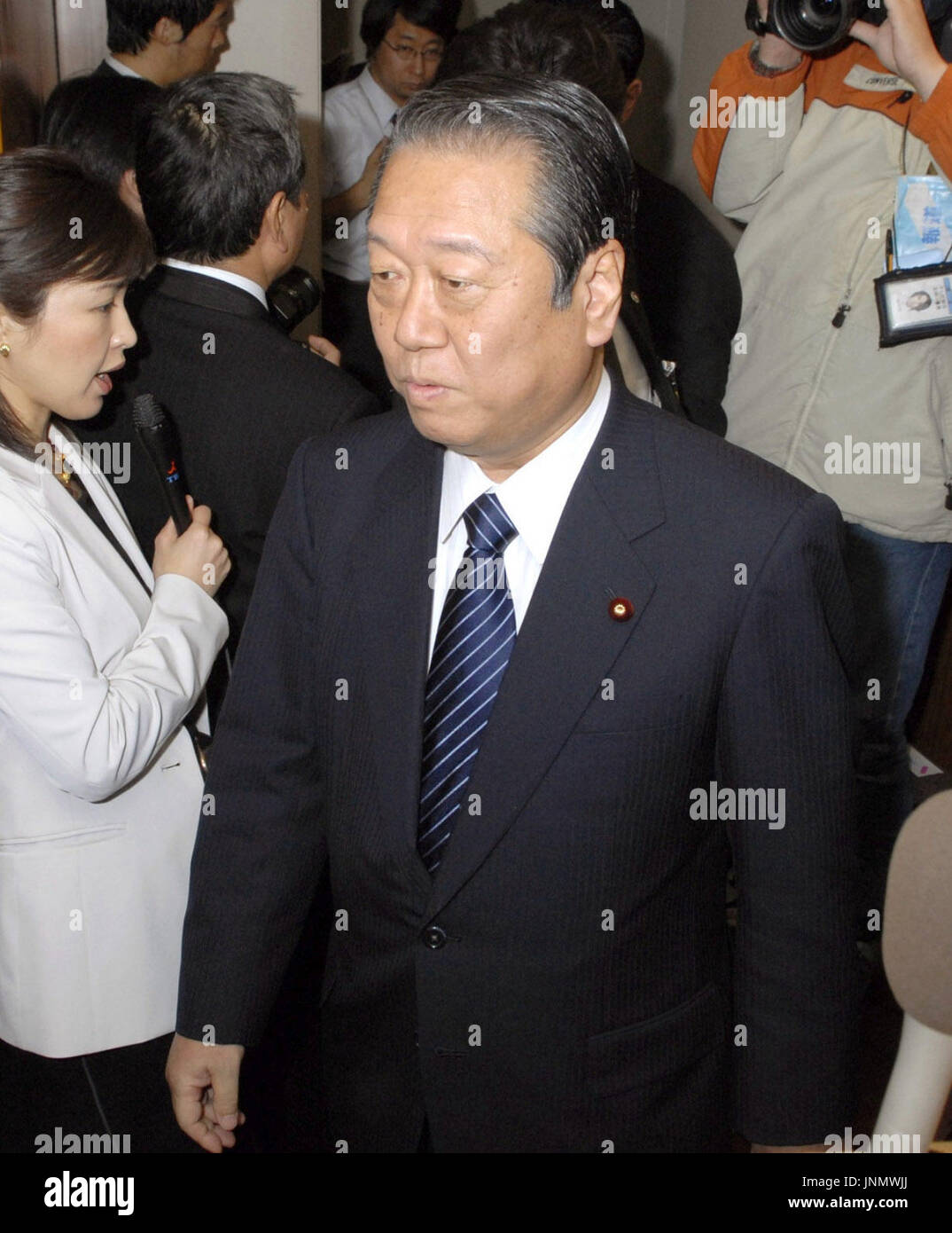 TOKYO, Japan - Veteran lawmaker Ichiro Ozawa arrives at a press conference room in Tokyo on ...