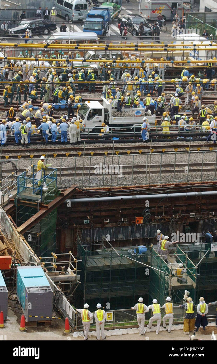 TOKYO, Japan - Workers conduct operations near Takadanobaba Station on ...