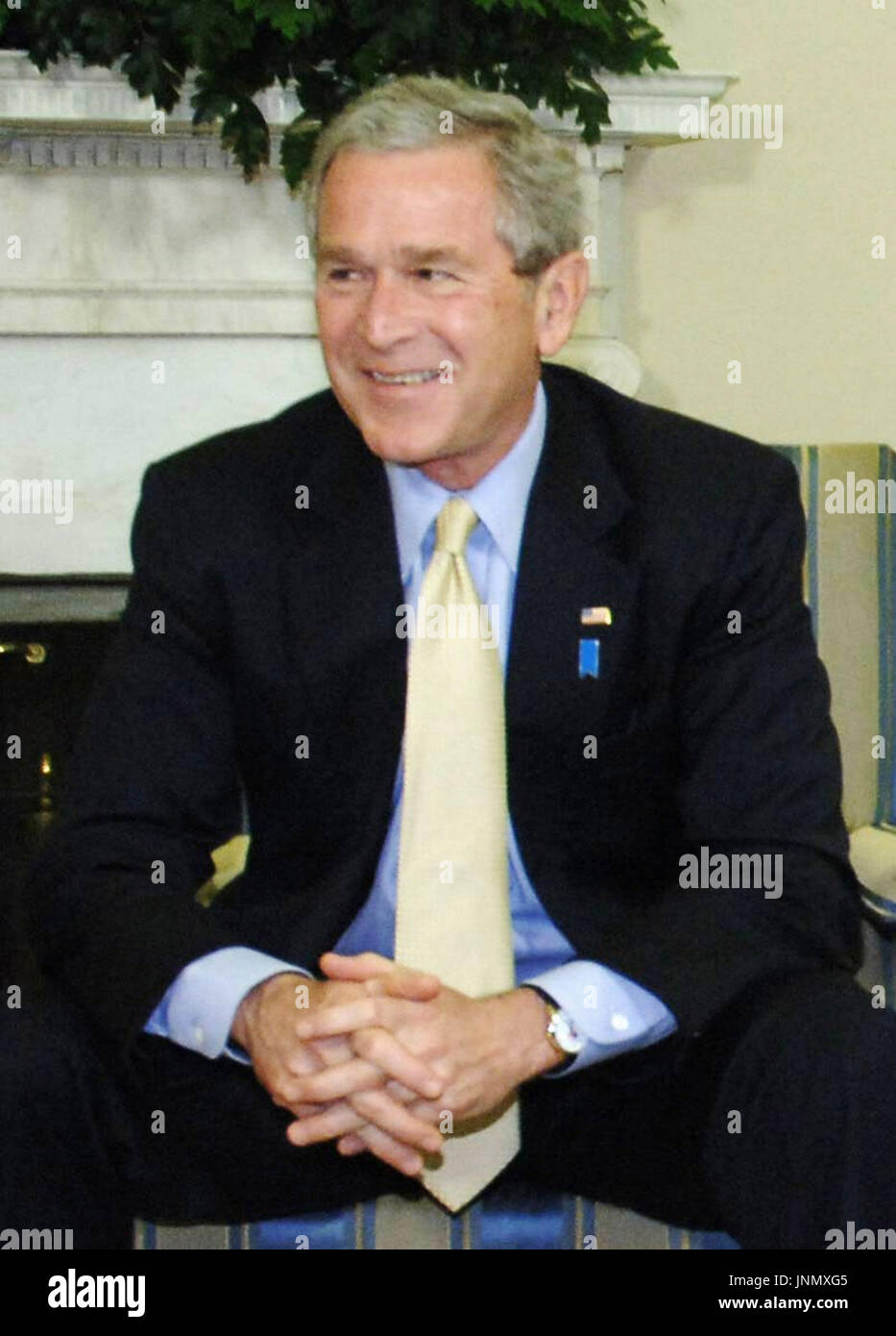 WASHINGTON, United States - U.S. President George W. Bush wears a blue ...