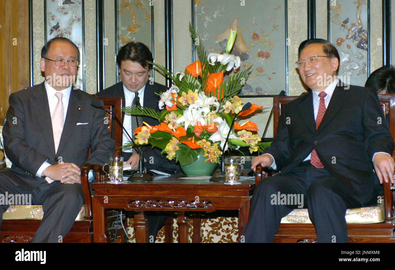 BEIJING, China - Tsutomu Takebe (L), secretary general of Japan's ...