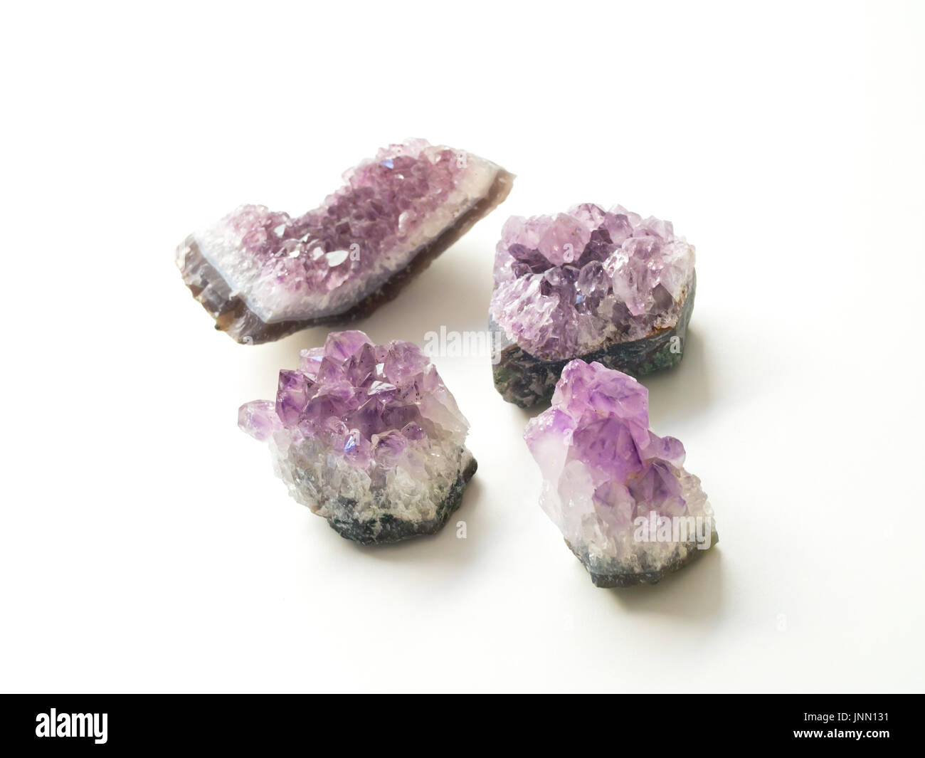 Four Amethyst geodes for crystal therapy treatments and reiki Stock ...