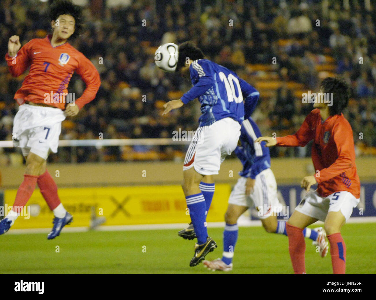 TOKYO, Japan - Japan Under-21 team midfielder Chikashi Masuda heads the ...