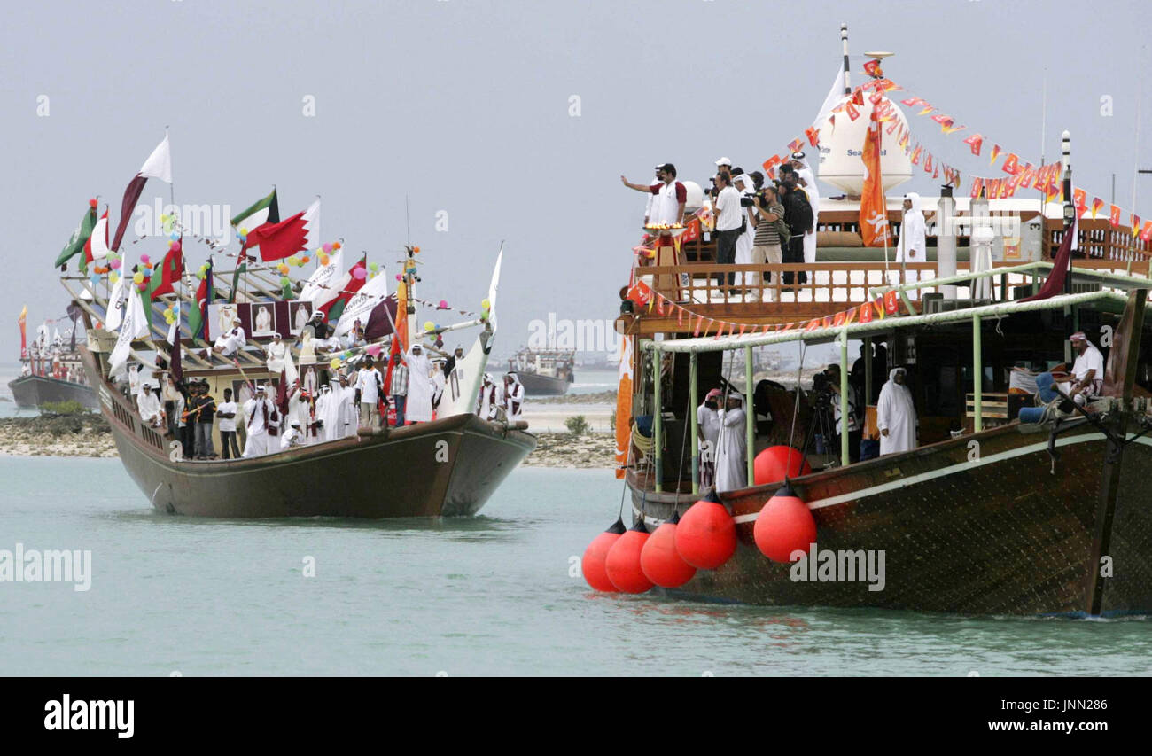 Al Shamal, Qatar - The flame for the 15th Asian Games arrives on board ...