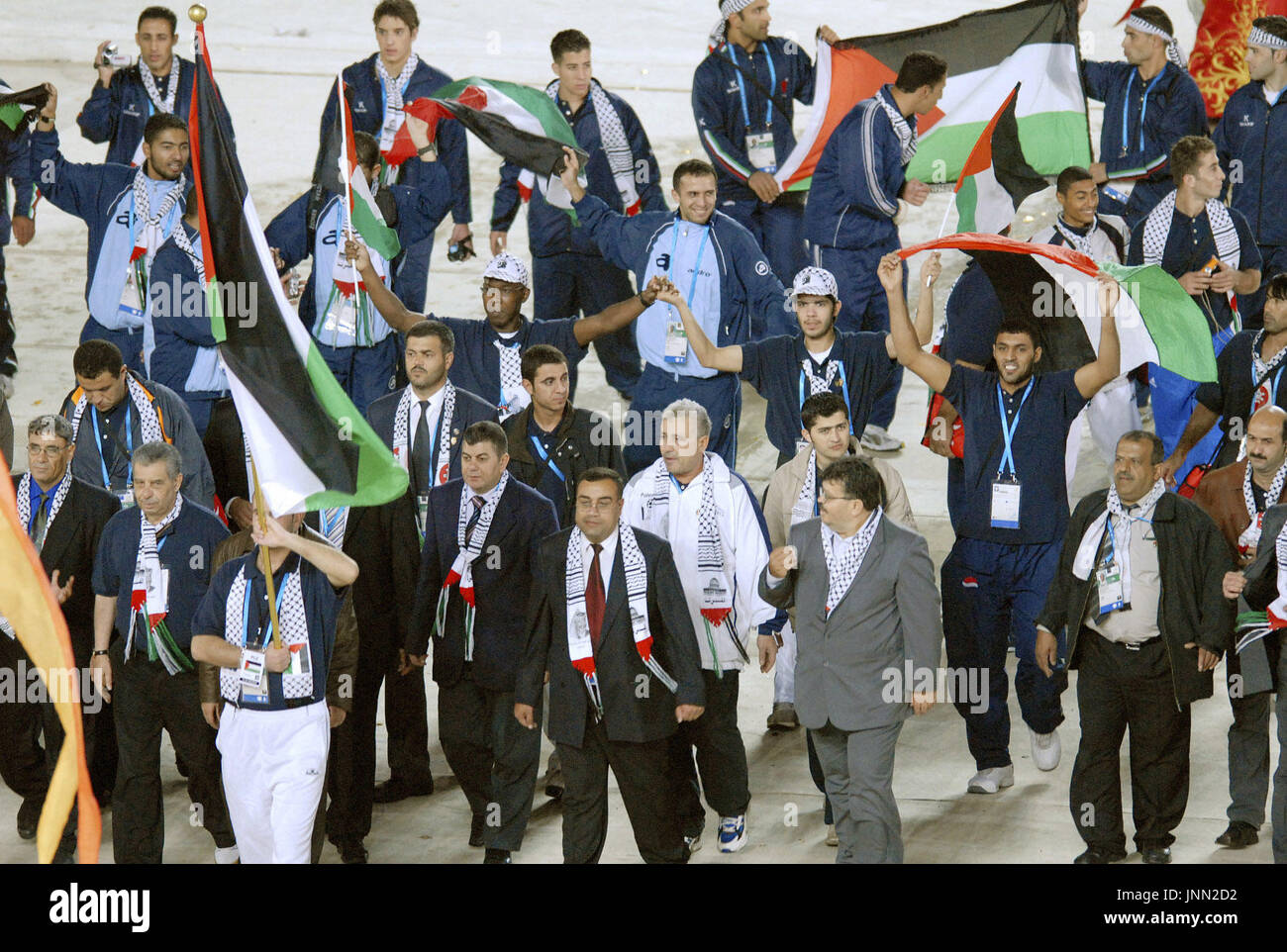 DOHA, Qatar - Palestinian athletes march during the opening ceremony of ...