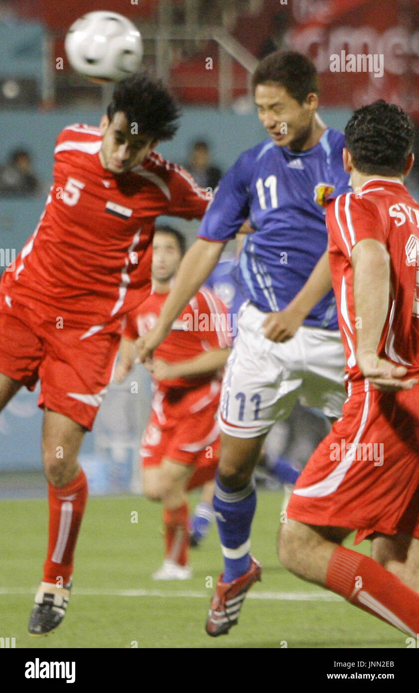 DOHA, Qatar - Japan Under-21 striker Sota Hirayama (C) scores the ...