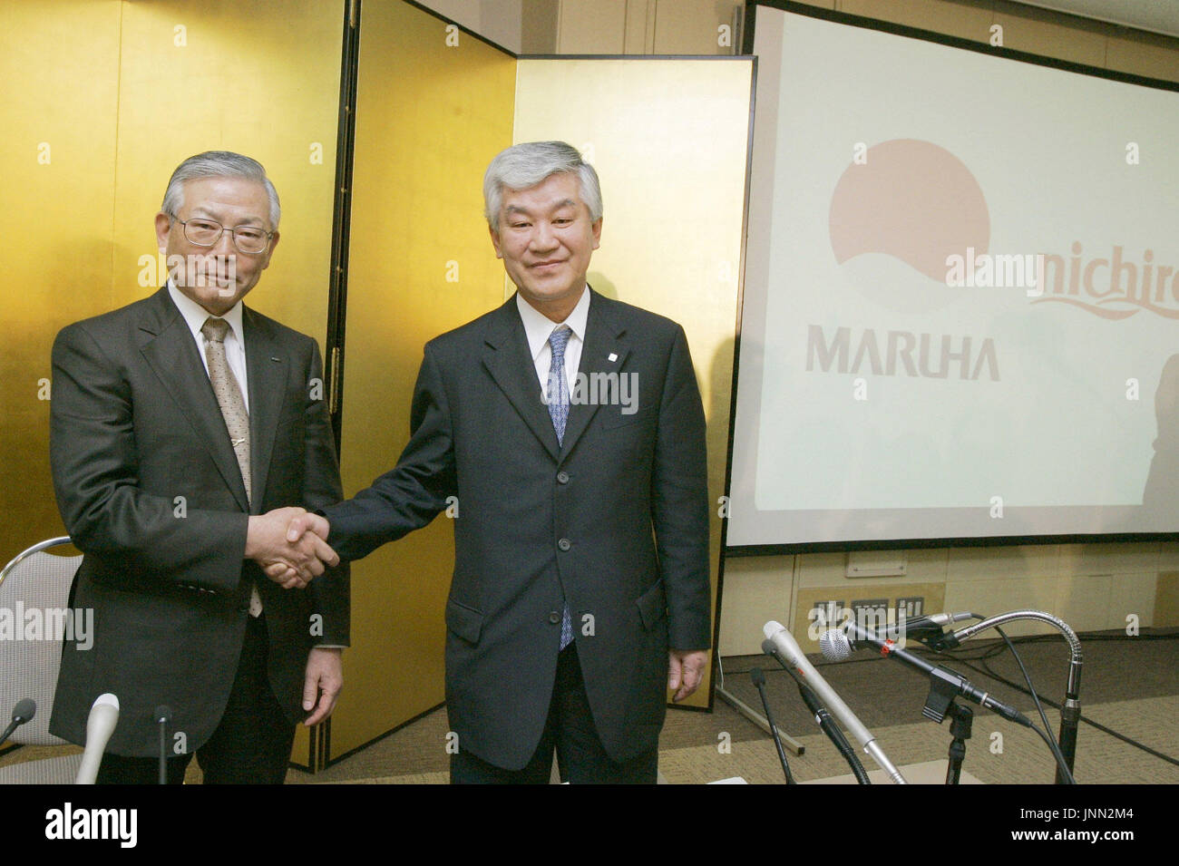 TOKYO, Japan - Tatsuhiko Tanaka (L), president of Nichiro Corp., and ...