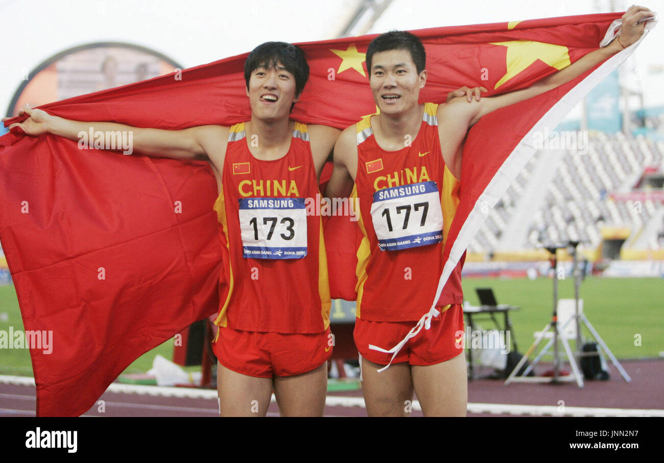 DOHA, Qatar - China's Liu Xiang (L) and his countryman Shi Dongpeng ...