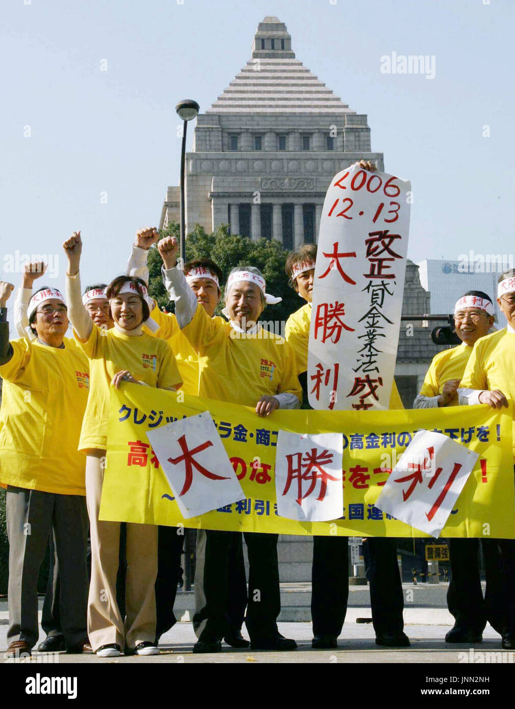 TOKYO, Japan - Members of civic groups express their joy outside the ...