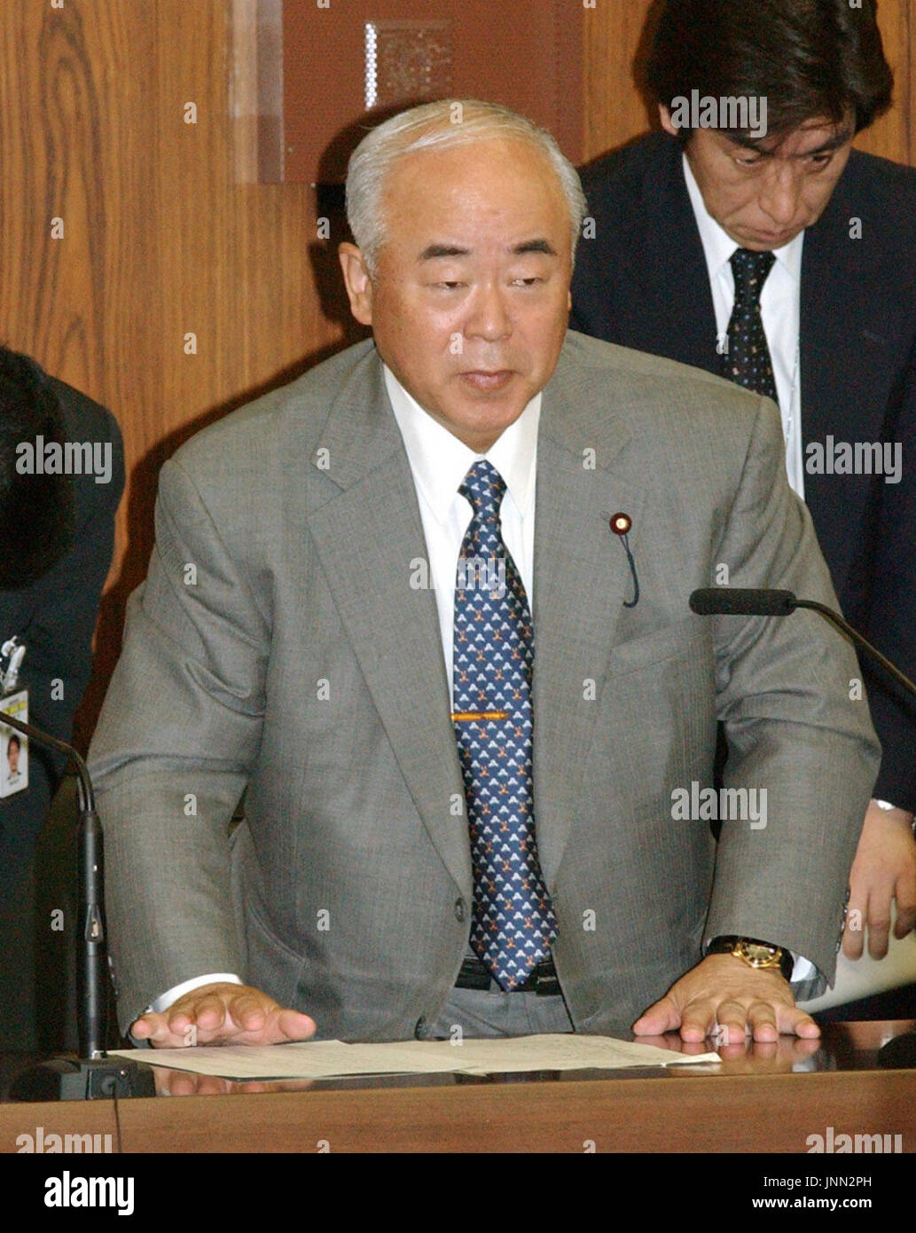 TOKYO, Japan - Defense Agency Director General Fumio Kyuma bows in a ...