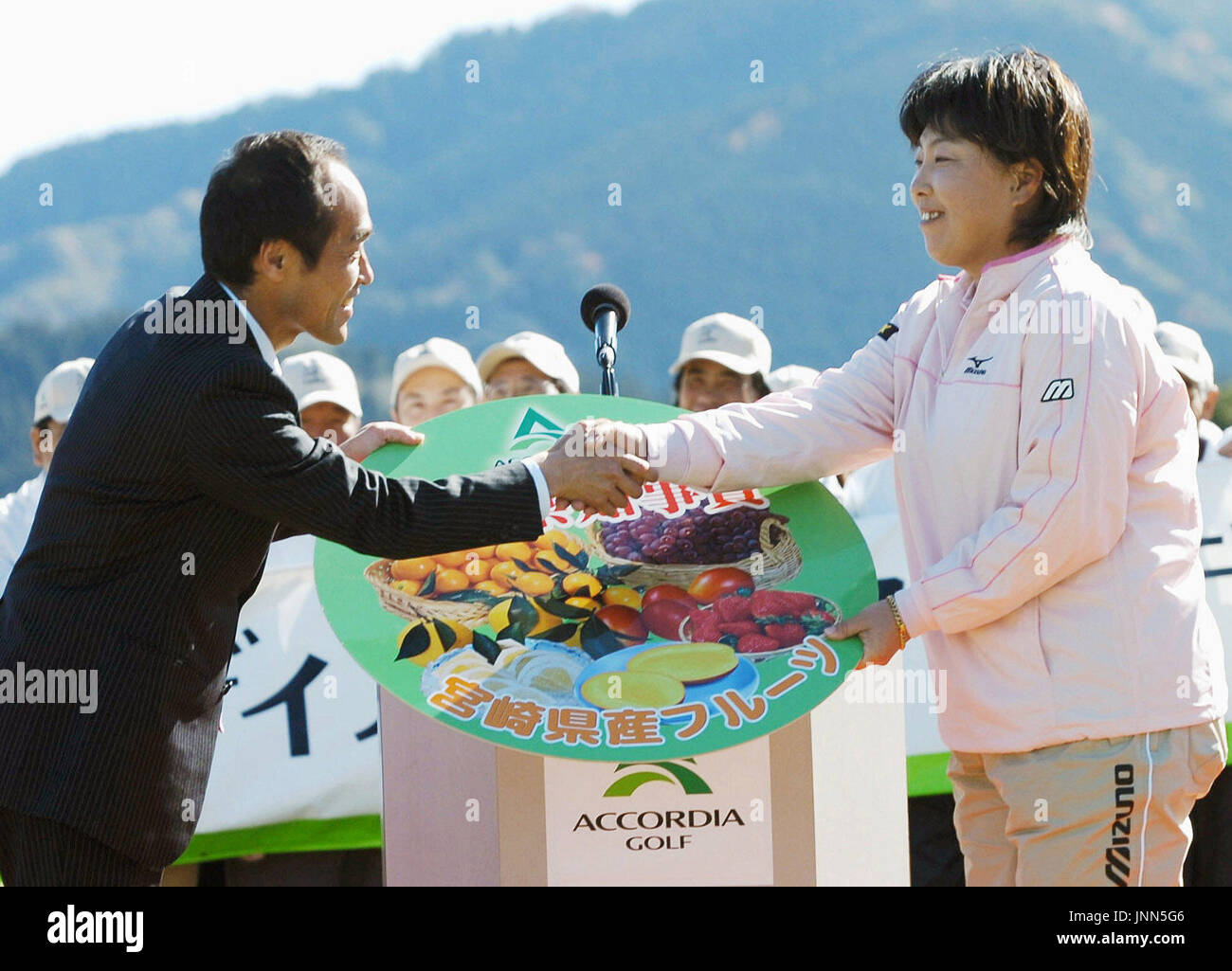 MIYAZAKI, Japan - Tour veteran Toshimi Kimura (R) gets congratulations ...