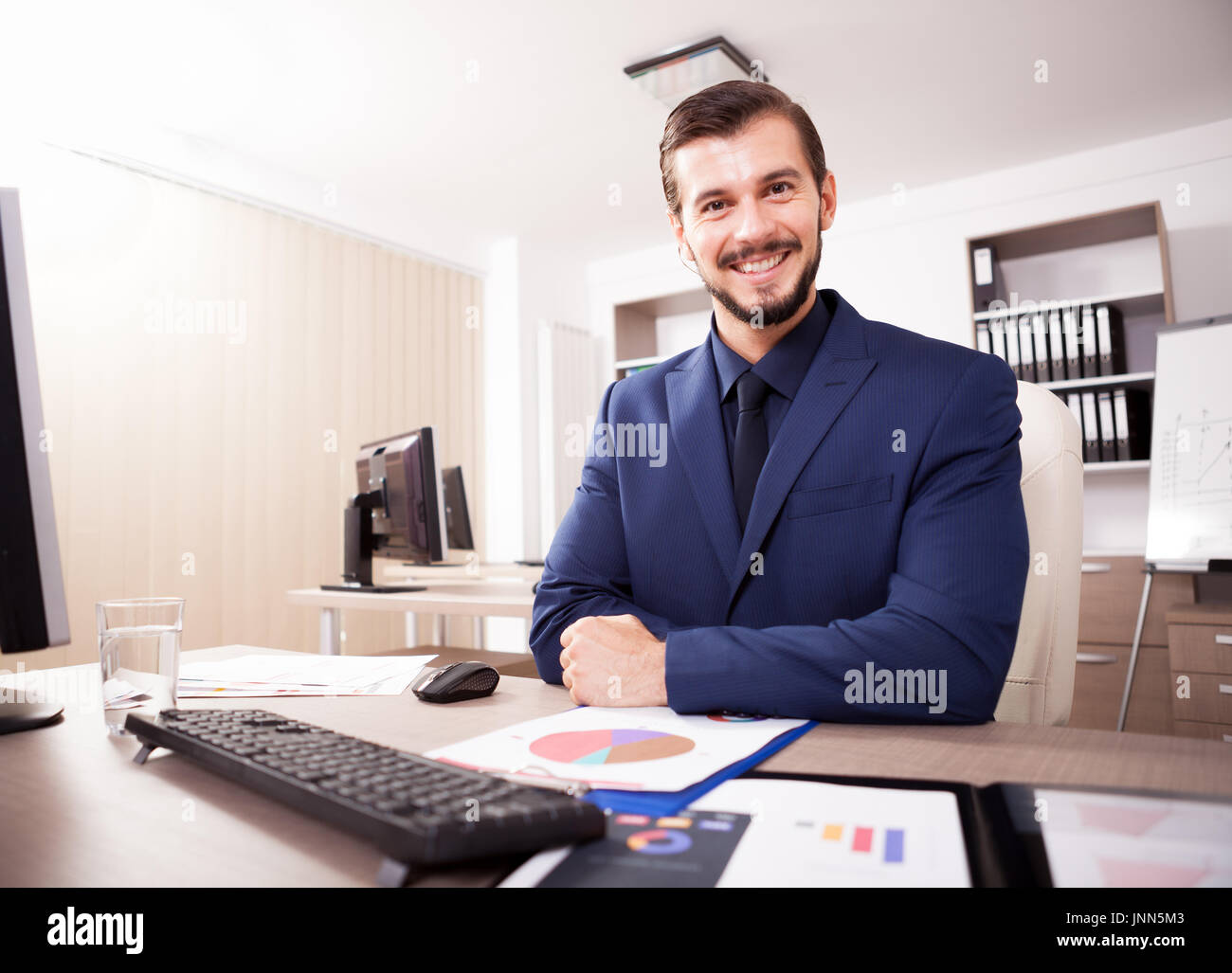 Communication concentration busy desktop hi-res stock photography and ...