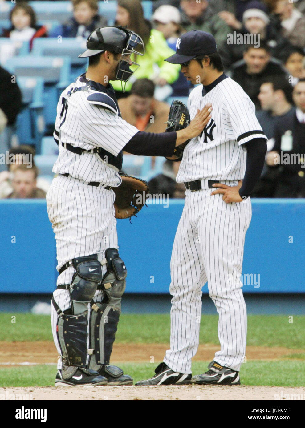 NEW YORK, United States - New York Yankees rookie Kei Igawa talks with ...
