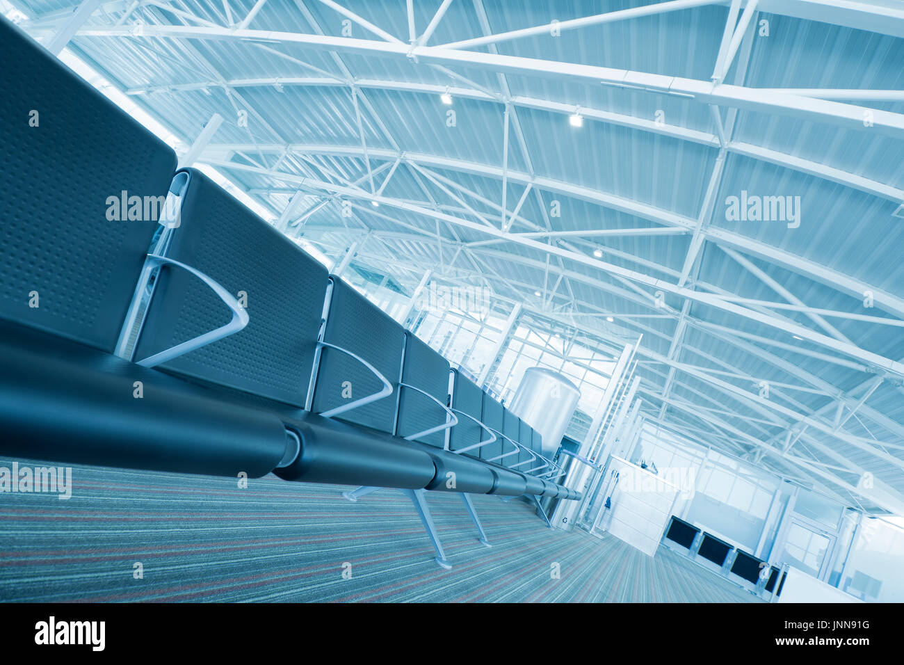 Waiting area of a modern airport terminal Stock Photo - Alamy
