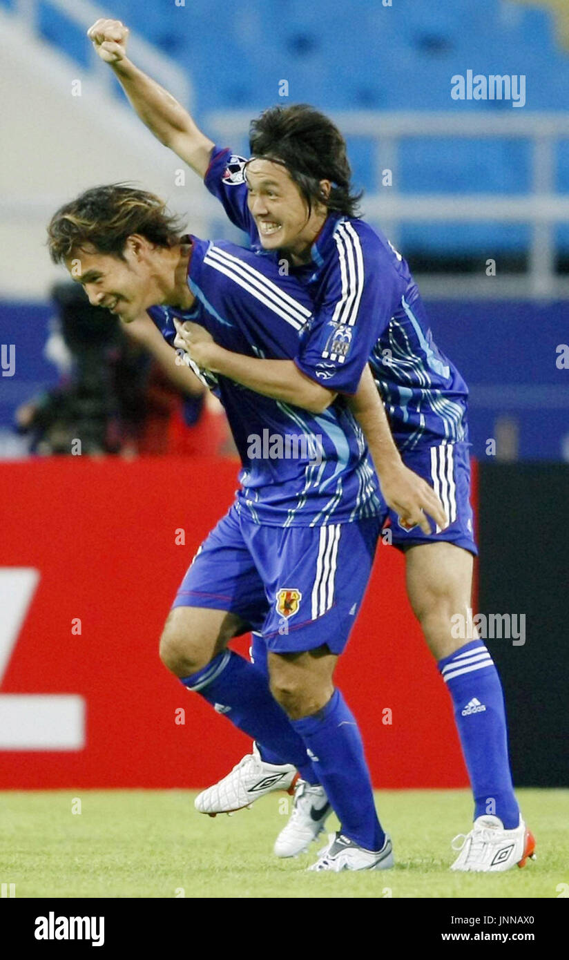 HANOI, Vietnam - Japan striker Naohiro Takahara (L) gets ...