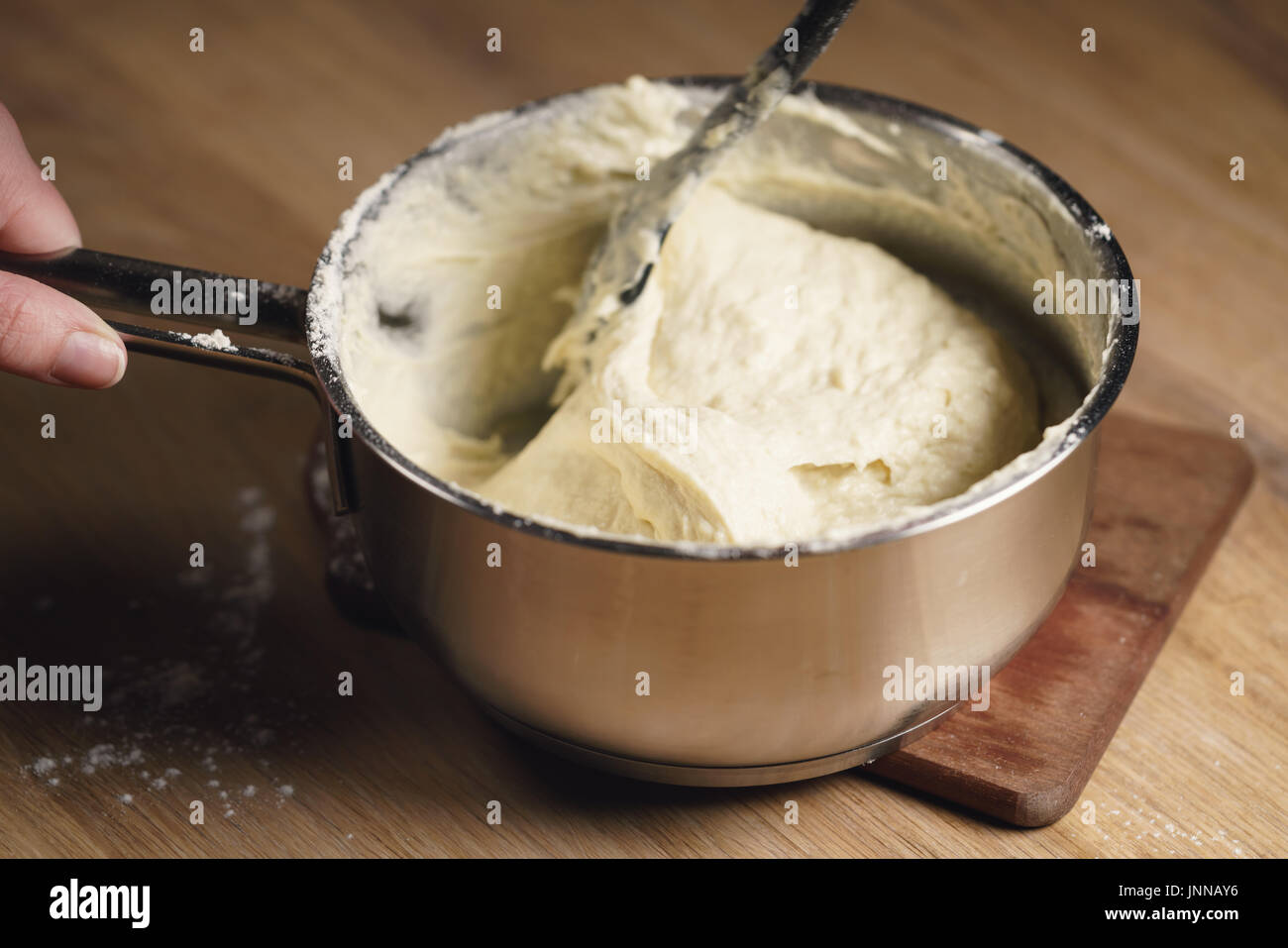 Female baker making dough hi-res stock photography and images - Alamy