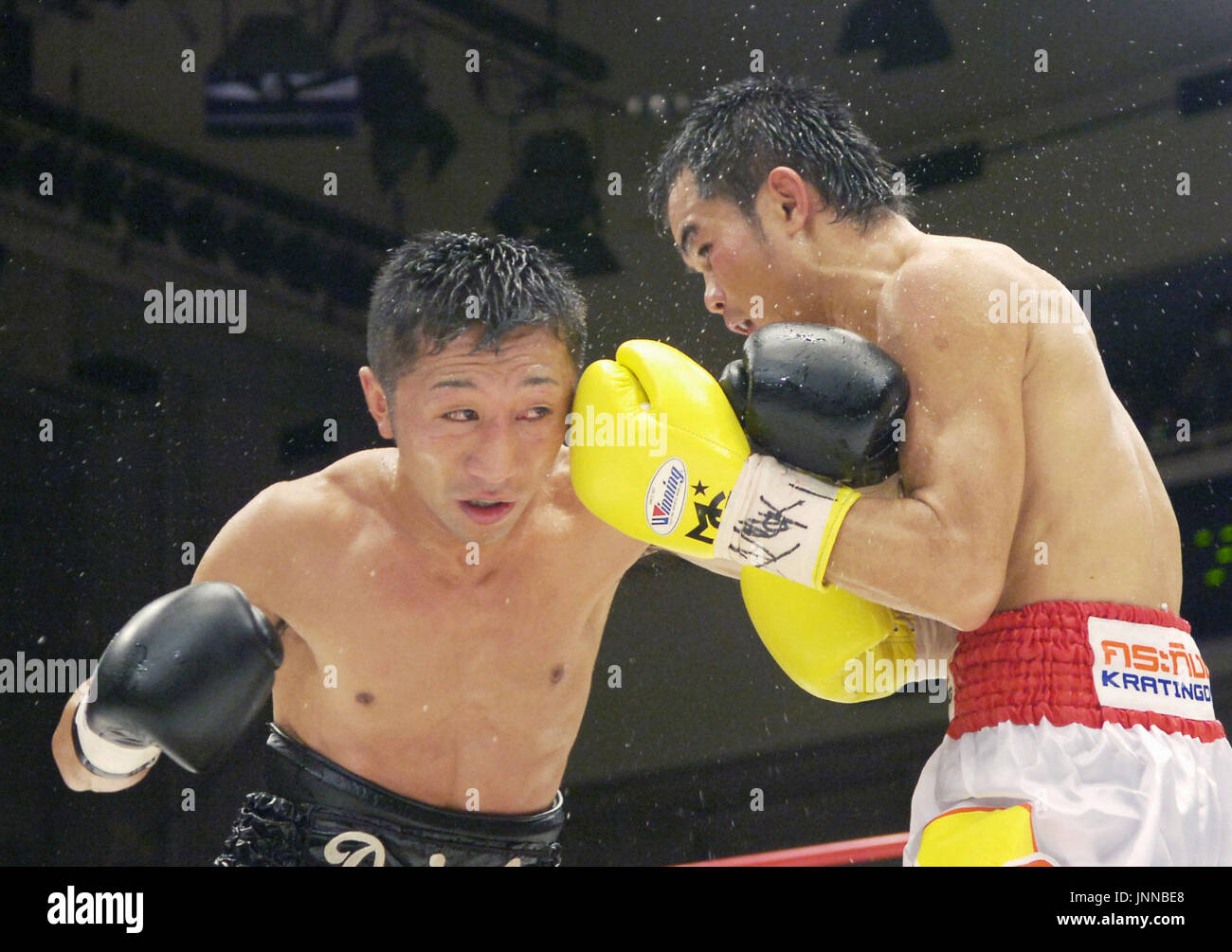 TOKYO, Japan - Japanese challenger Daisuke Naito puts champion ...