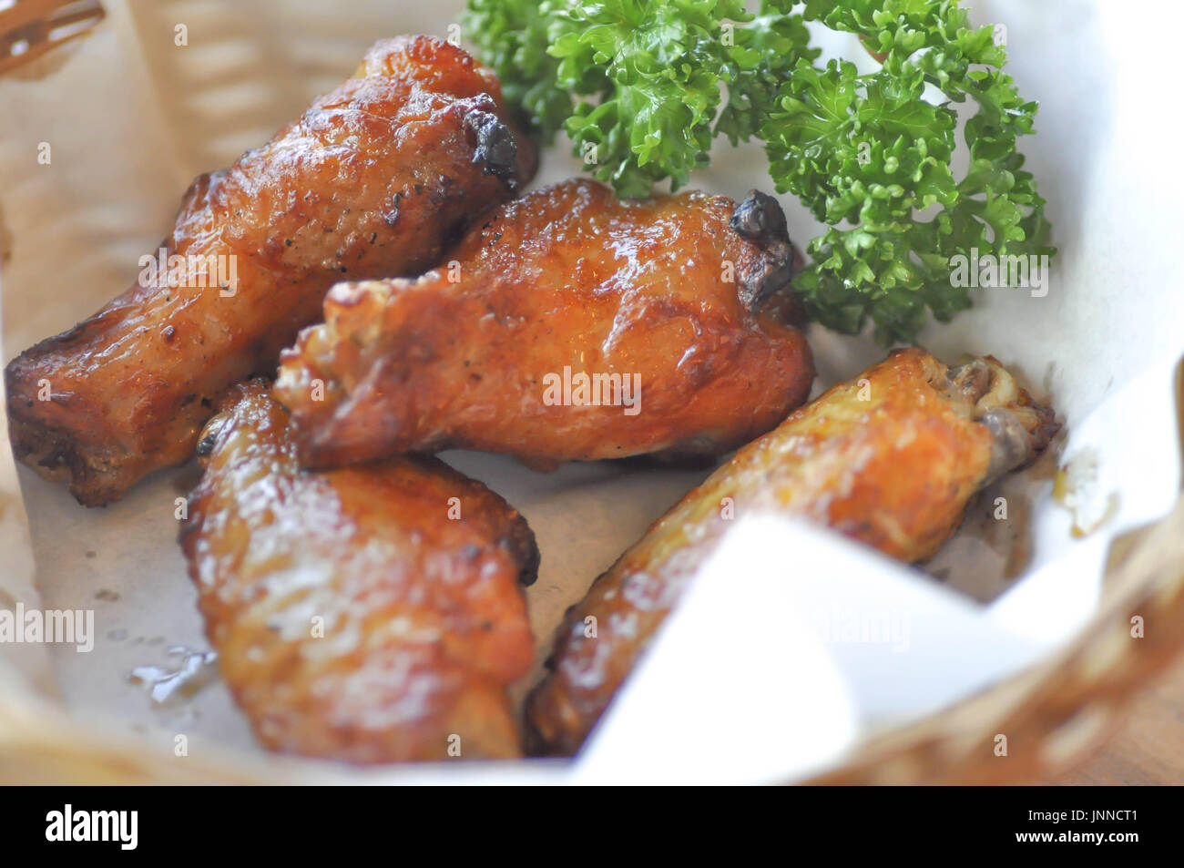 fried chicken or chicken wing in a basket Stock Photo - Alamy