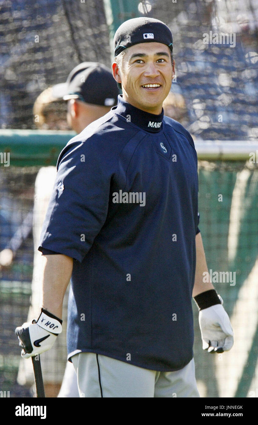 PEORIA, United States - Seattle Mariners catcher Kenji Jojima smiles ...