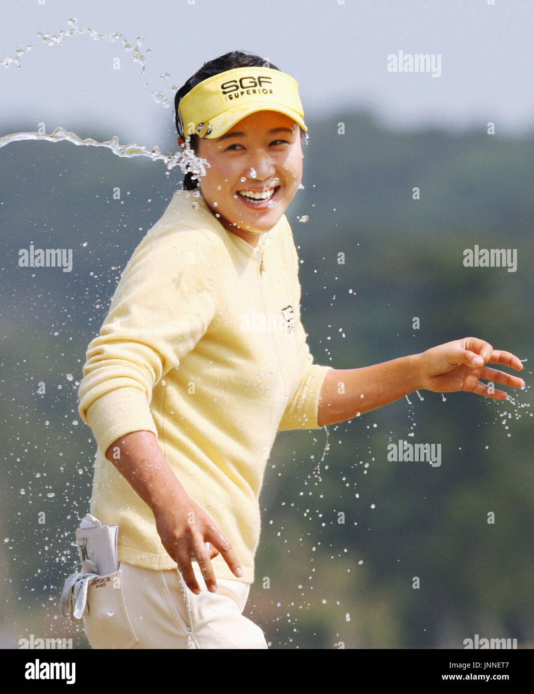 NAHA, Japan - Water is hurled onto Song Bo Bae in congratulations after ...
