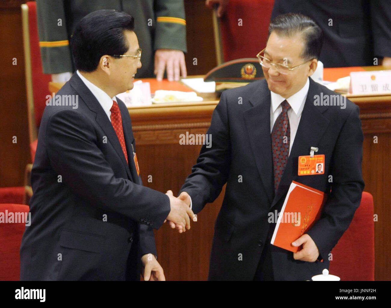 BEIJING, China - Chinese President Hu Jintao (L) shakes hands with ...