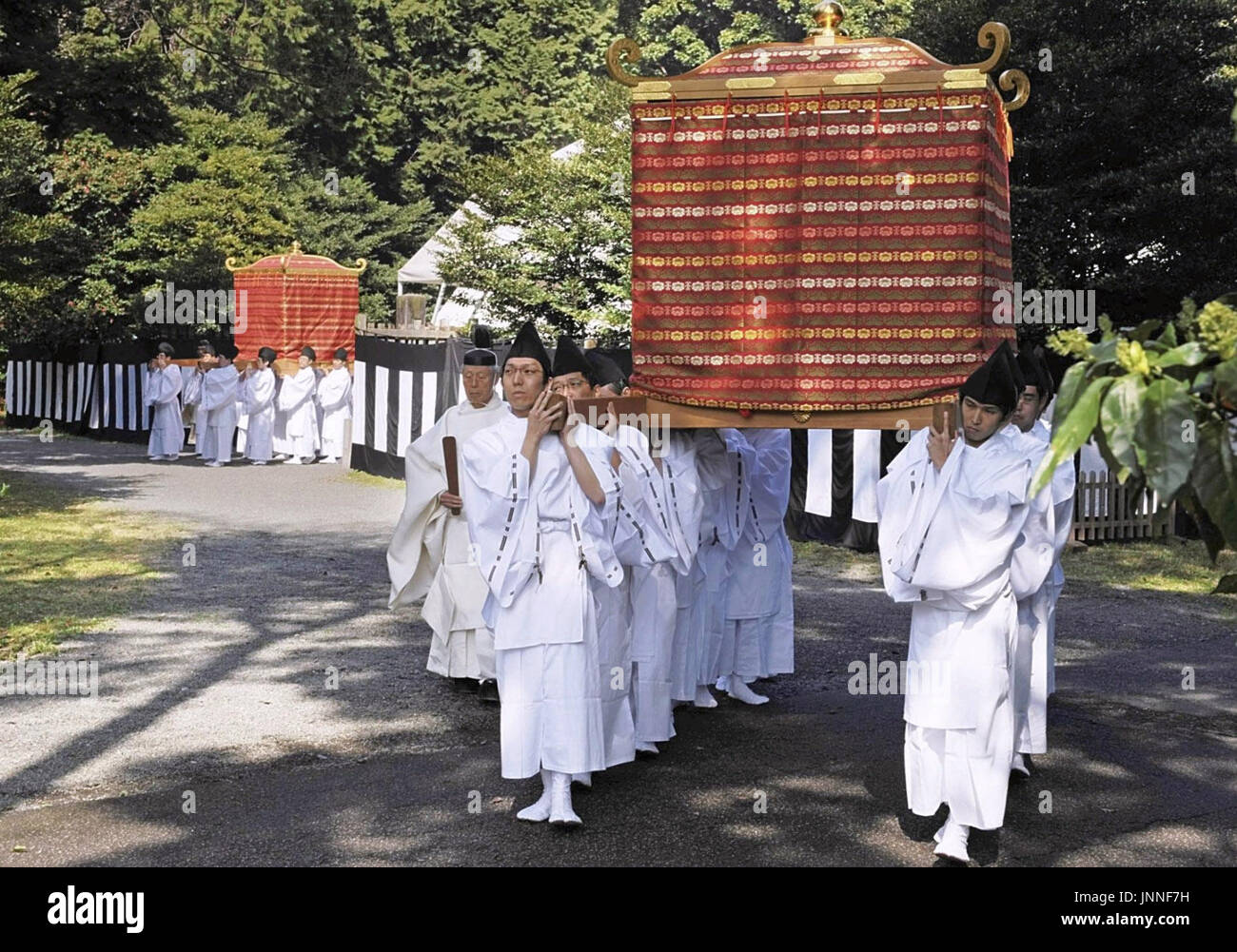TOKYO, Japan - Shinto priests and employees of the Imperial Household ...