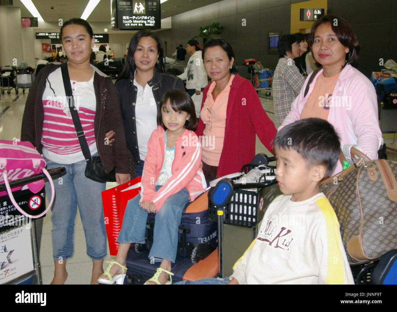 NAGOYA, Japan - Three Japanese-Filipino children and their Filipino ...