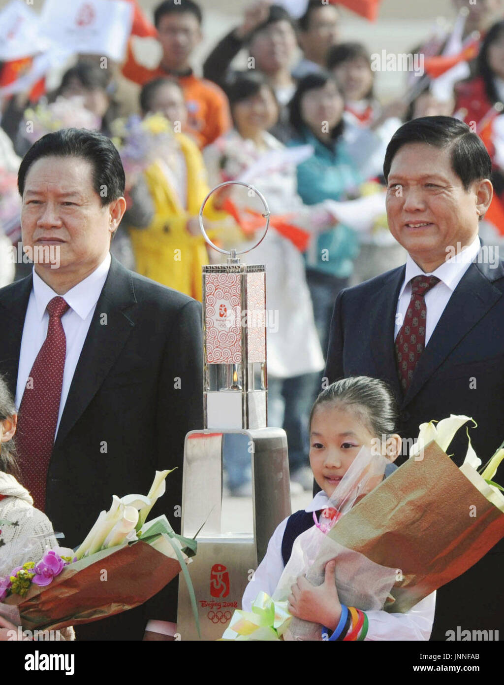 BEIJING, China - The Olympic torch (C) arrived in Beijing on March 31 ...