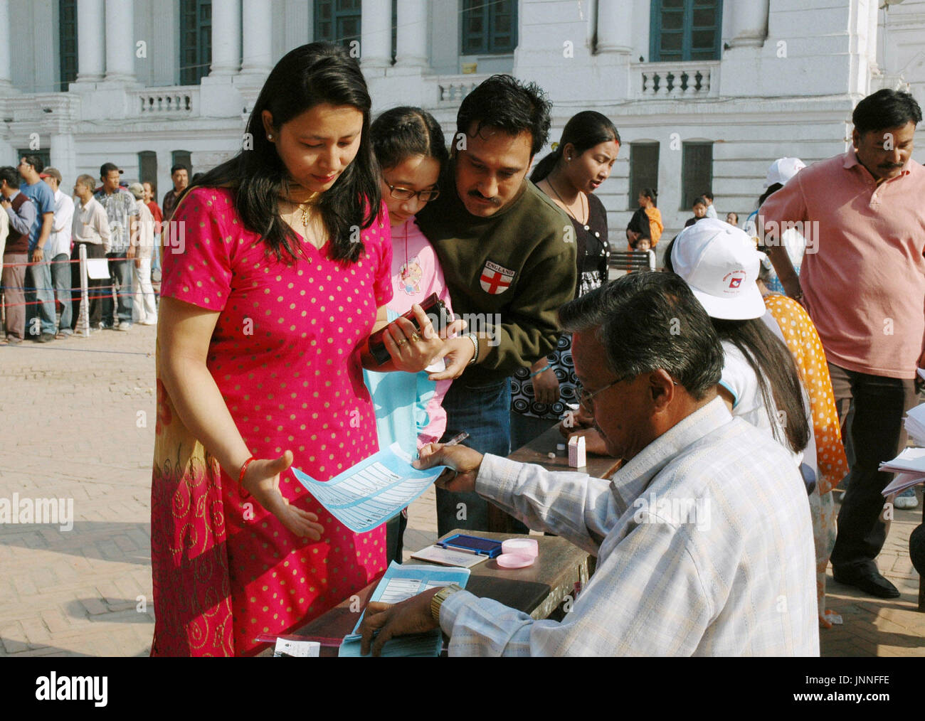 KATHMANDU, Nepal - Nepalese people come to a voting center in Kathmandu ...