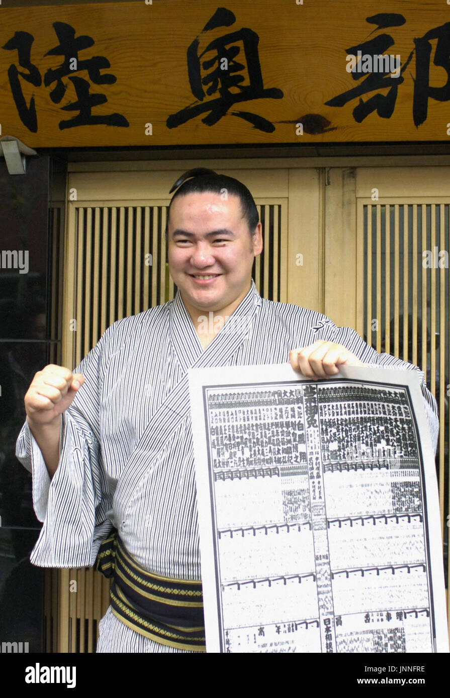 TOKYO, Japan - Mongolia's Hakuba poses with a sumo rankings list for ...
