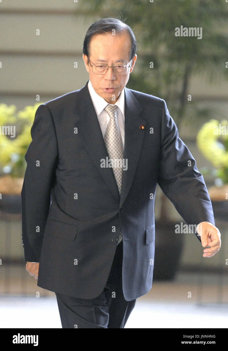 TOKYO, Japan - Prime Minister Yasuo Fukuda enters the prime minister's ...