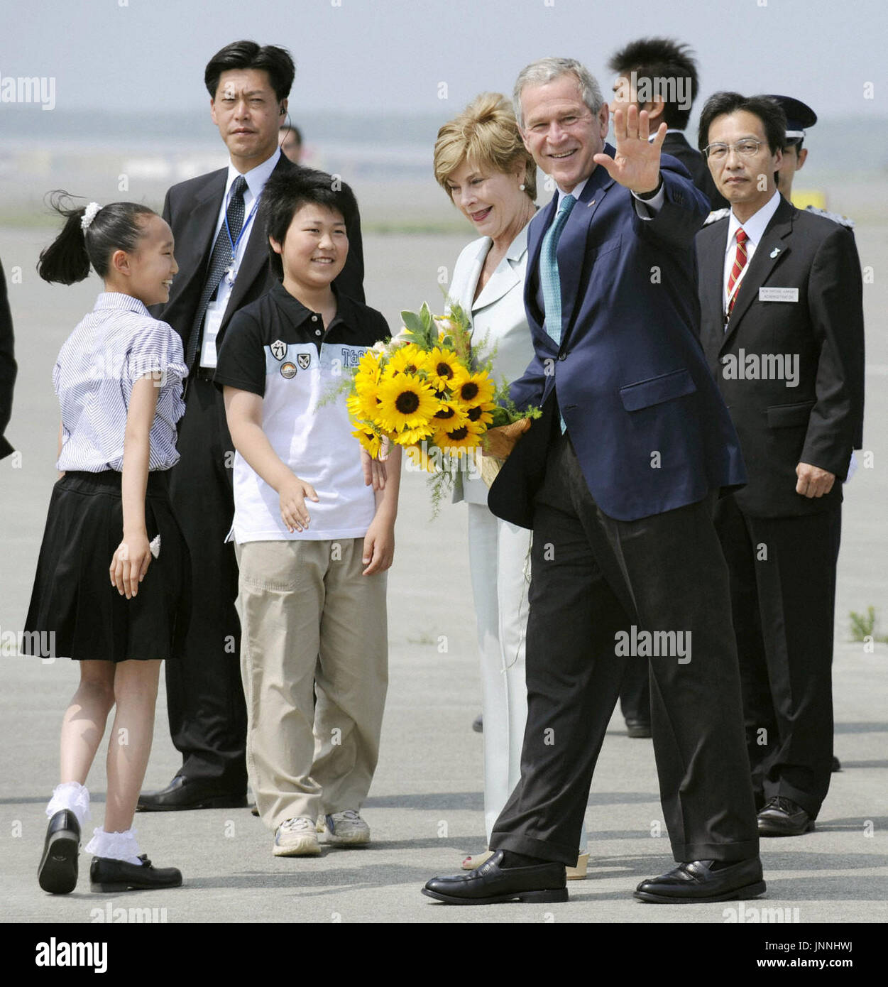 CHITOSE, Japan - U.S. President George W. Bush (R in front) and his ...