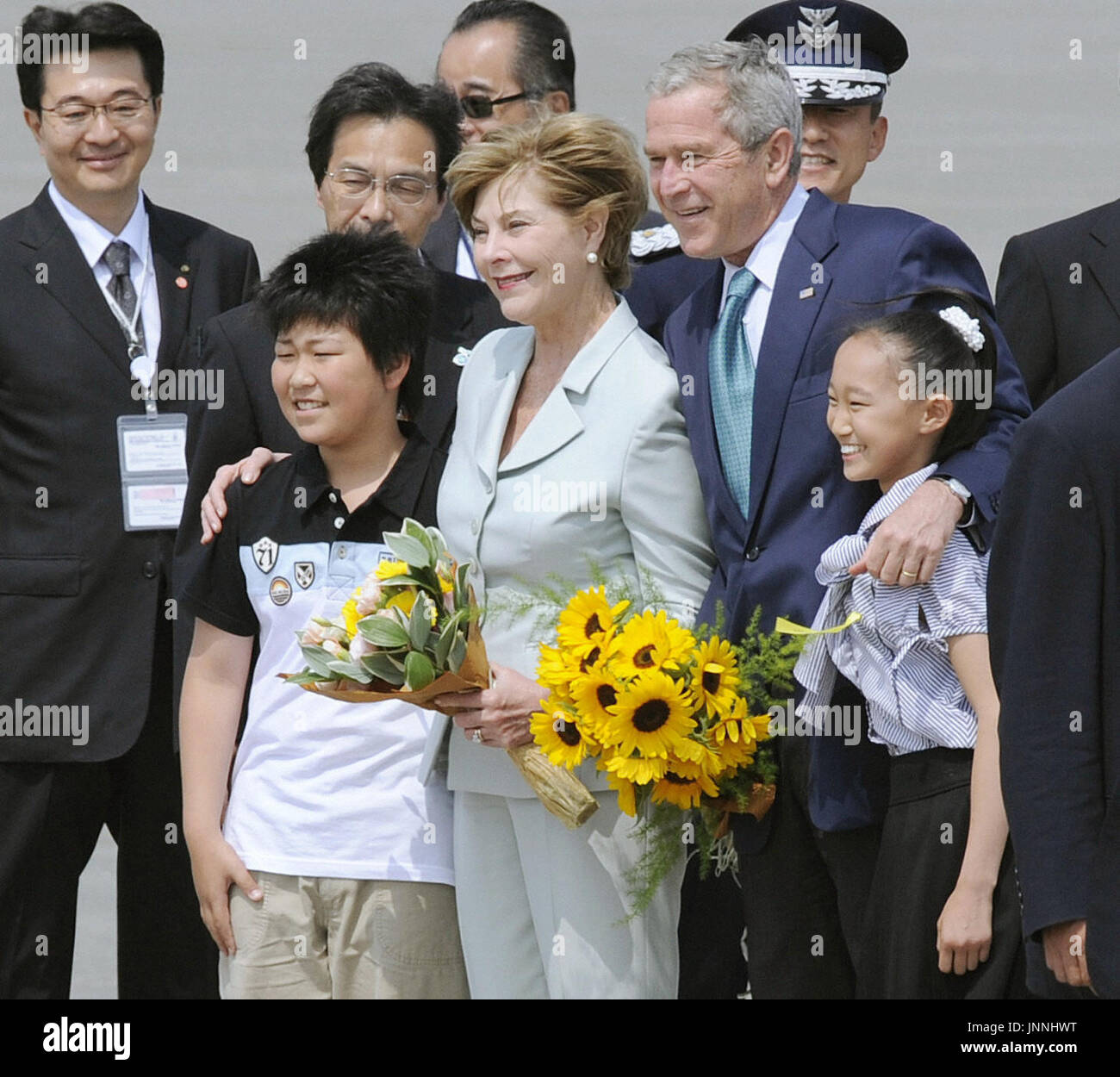 CHITOSE, Japan - U.S. President George W. Bush (R in center, front) and ...