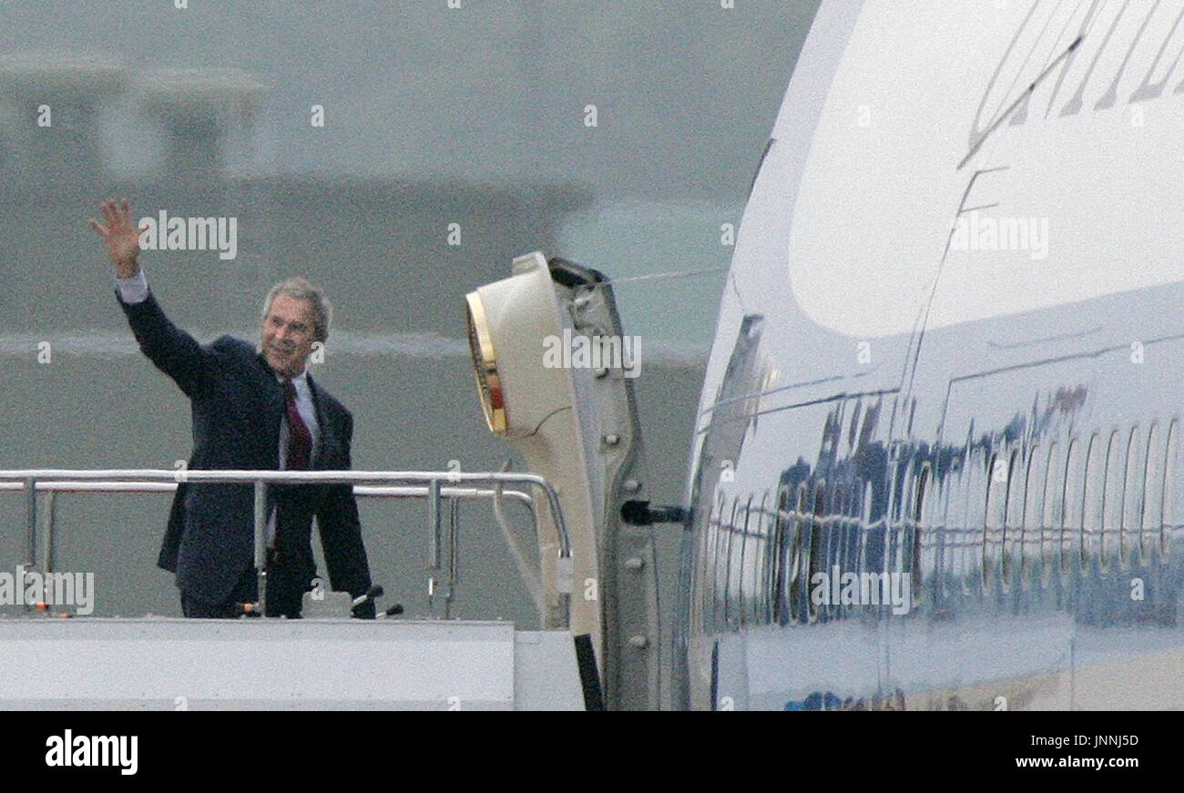 SAPPORO, Japan - U.S. President George W. Bush waves as he boards Air ...
