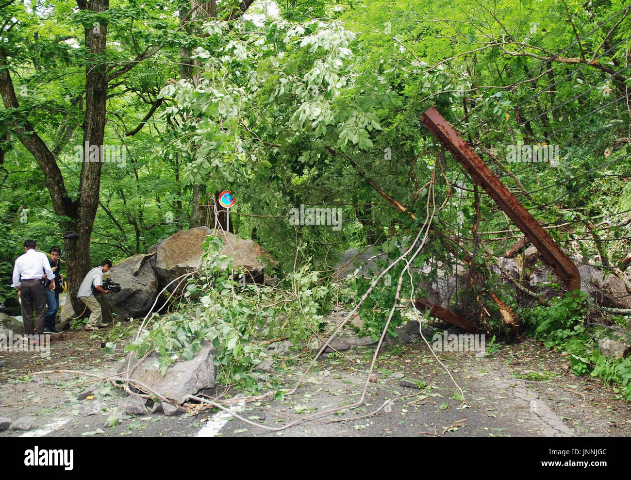 TOWADA, Japan - Rock falls triggered by a strong earthquake block a ...
