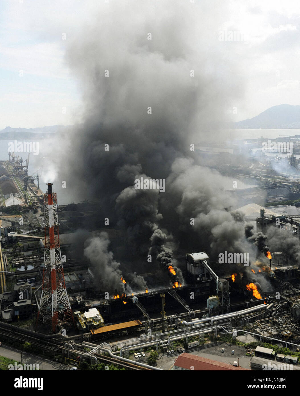 FUKUOKA, Japan - Black smoke is spewing at several points from a gas ...