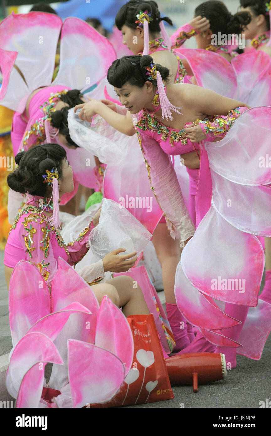 BEIJING, China - Women chat after their performance in a rehearsal of ...